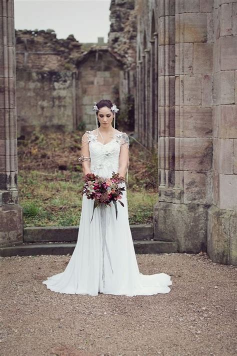 Bride Looking At Bouquet Modern Viking Wedding Inspiration Viking