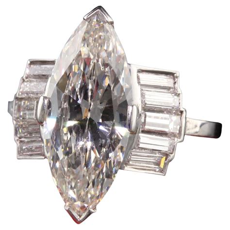 Timeless Art Deco 205 Carat Emerald Cut Diamond Platinum Engagement