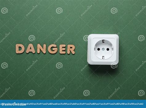 Plug Into Electricity Socket The Power Outlets On The Wood Wall Stock Image