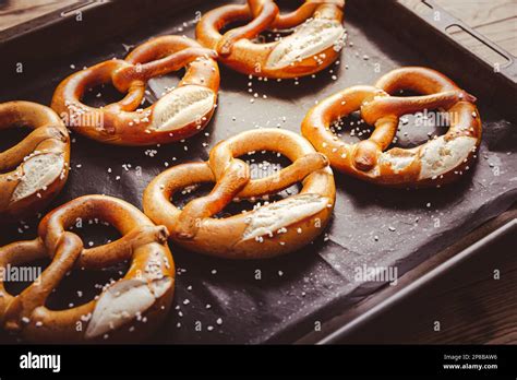Fresh Baked Homemade German Pretzel With Sea Salt On Baking Sheet