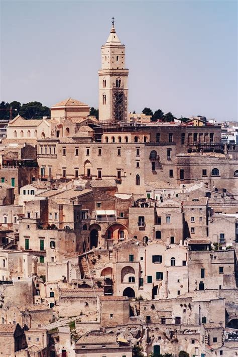 Vertical Shot Of Modern Buildings In Sassi Di Matera Italy Stock Image