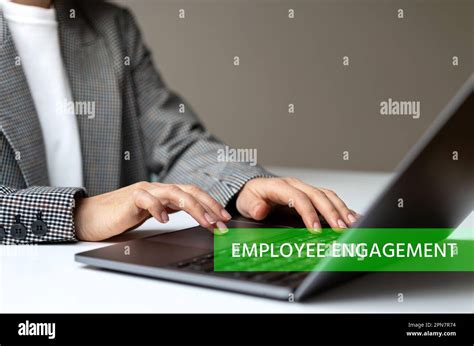Human Resource Manager Using Laptop Text Employee Engagement Stock Photo Alamy