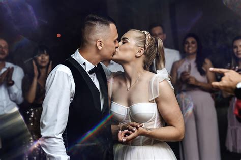 Couple Kiss In Corset Gown Photo By Laura Žygė Photography