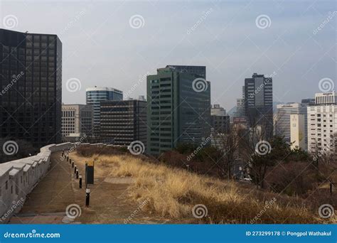 Namsan Baekbeom Square Park Near Seoul City Walls And Namsan Tower During Winter Evening At