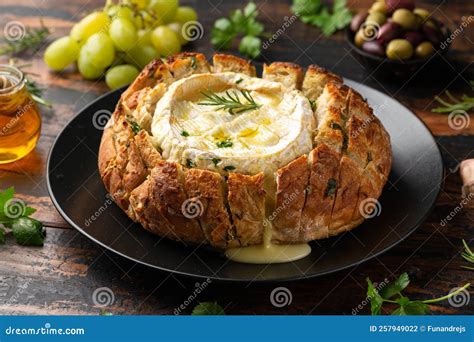 Baked Camembert Cheese In Sourdough Bread With Rosemary Garlic Thyme Stock Photo Image Of