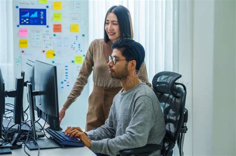 Asian And Indian Developer Team Discussion Feedback Analysis Coding