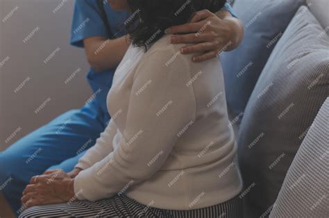 Premium Photo Cropped Shot Of A Female Nurse Hold Her Senior Patient