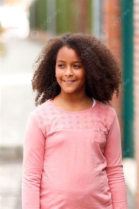 Cute African American Girl In The Street With Afro Hair Cute African