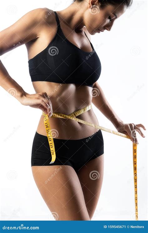 Woman Measuring Her Slim Body Isolated On White Background Stock Image