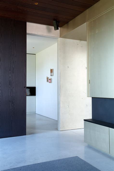 Brutalist Inspired Residence By Clauwers And Simon Is Arranged Around A