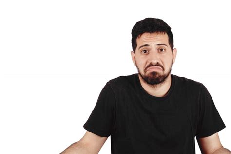 Premium Photo Young Man With Confused Expression