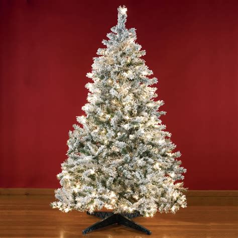 The 8 Foot Prelit Flocked Christmas Tree Hammacher Schlemmer
