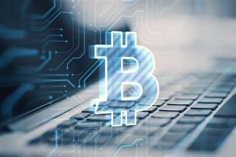 Premium Photo Close Up Of Laptop On Desktop With Glowing Bitcoin