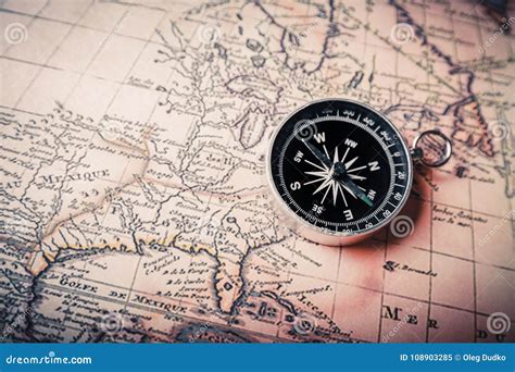 Brass Antique Compass On Old Brown Map Stock Image Image Of Bronze