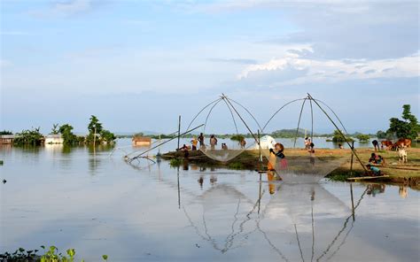 Assam Floods In Pictures 52 Lives Lost 21 Lakh Impacted Across 29