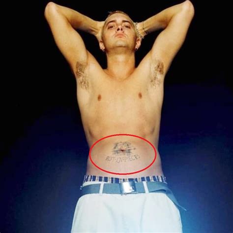 Eminems 9 Tattoos And Their Meanings Body Art Guru
