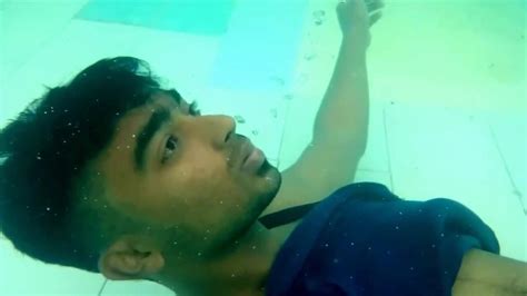 Underwater Barefaced Indian Drowning Clothed In Pool Underwater Barefaced Indian Drowning Clothed In Pool