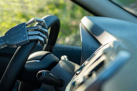Robot Arm On A Steering Wheel Artificial Intelligence Drives A Car Autonomous Vehicle Concept Robot Arm On A Steering Wheel Artificial Intelligence Drives A Car Autonomous Vehicle Concept