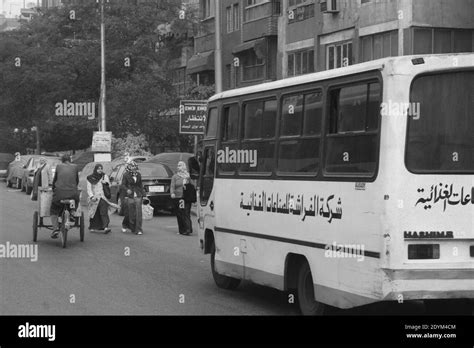 Cairo Egypt Life In The Street People And Old Bus A Man On Tricycle