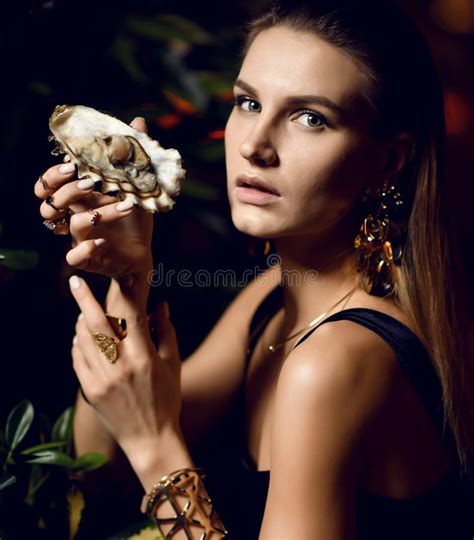 Beautiful Fashion Brunette Woman In Expensive Interior Restaurant With