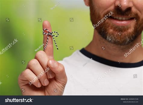 Man Showing Index Finger Tied Bow Stock Photo 2209457339 Shutterstock