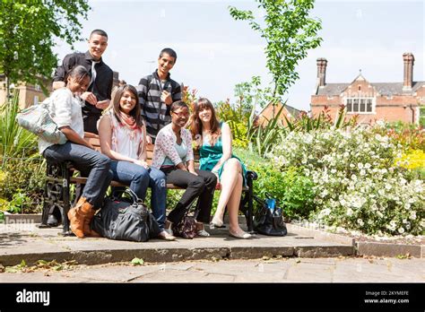 Teenage Friends School Break A Candid Moment From A Group Of Friendly