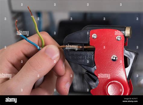 Close Up Of Electrician Hands Stripping Electrical Wires Stock Photo Alamy