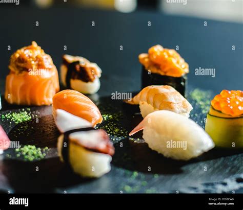 Maki And Nigiri Sushi Variety With Salmon Shrimp Avocado And Tuna At