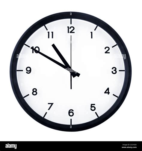 Classic Analog Clock Pointing At Ten Fifty Isolated On White