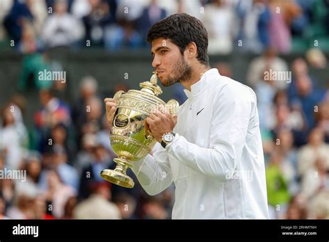 Spanish Tennis Player Carlos Alcaraz Esp Holding The Championship