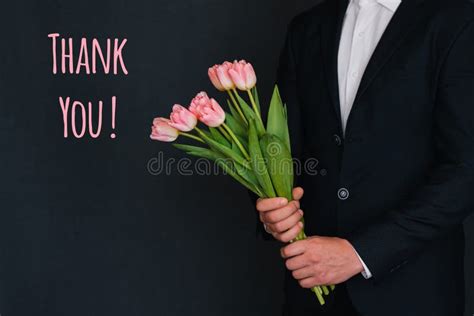 Bouquet Of Pink Flowers Of Tulips In Menand X27 S Hands Greeting Card