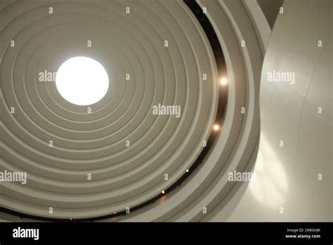 Illuminated Circular Skylight Seen From Below Concentric Circles Modern White Architecture