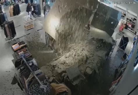 Shopper Runs For Cover Seconds Before Store Ceiling Collapses