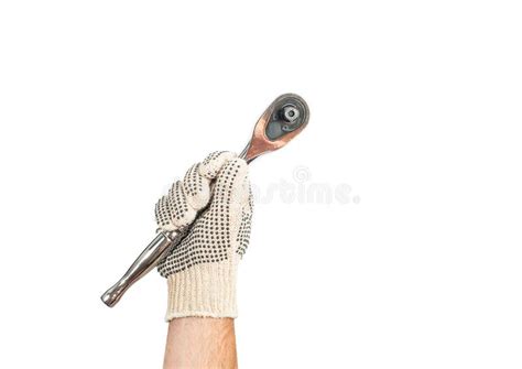 Tool Hand In Glove Is Holding Socket Wrench On White Background Stock