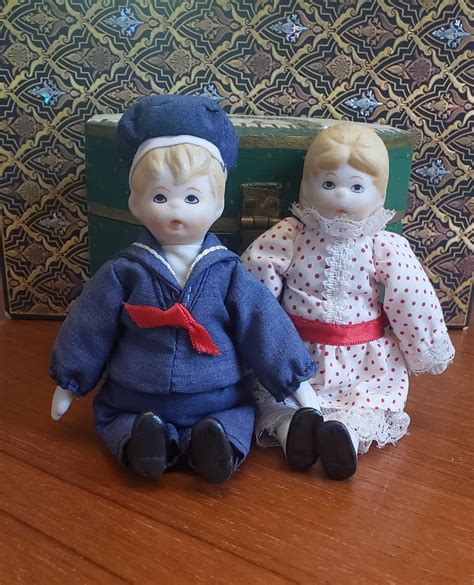 Pouting Vintage Dolls Porcelain And Cloth Sailor And Polka Dot Girl