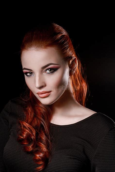 Redhead Girl In Black Dress On Black Background Beauty Stock Image