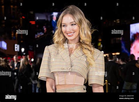 Roxy Horner Poses For Photographers Upon Arrival For The Premiere Of