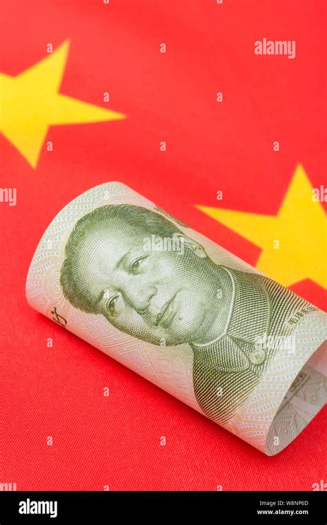 Close Up Shot Chinese Yuan 1 Renminbi Banknote Bill And Red Chinese Flag Metaphor Us China Trade