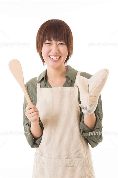 料理をする若い女性 写真素材 [ 2293278 ] フォトライブラリー Photolibrary