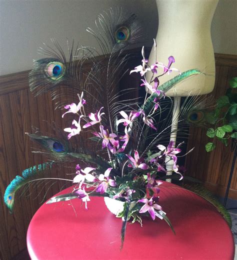 Peacock Feather And Orchid Arrangement Orchid Arrangements Peacock