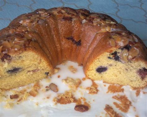 Lemon Pudding Cake W Mixed Berries And Powdered Sugar Glaze Recipe