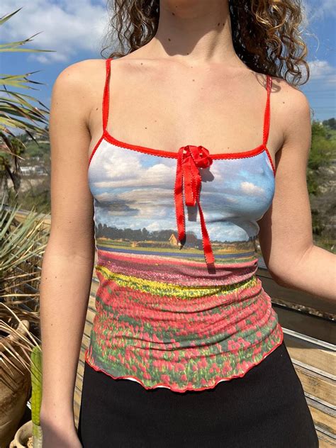 A Tulip Decorated Cami With Red Embroidery Straps A Bow To Match And A Lettuce Hem Perfect