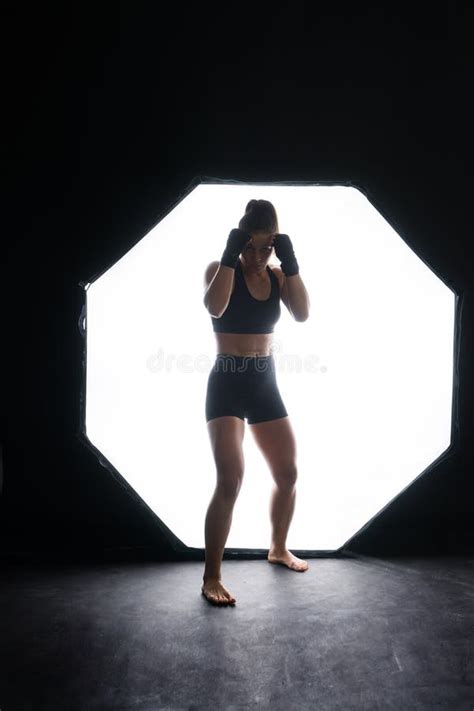 Young Woman Athletic Female Mma Fighter Training Concept Of Sport
