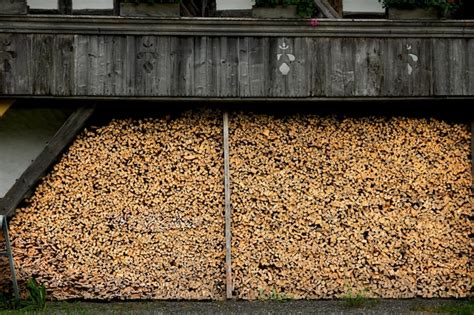 Premium Photo A Picture With Noise Effect Of Wood Been Stack Under A