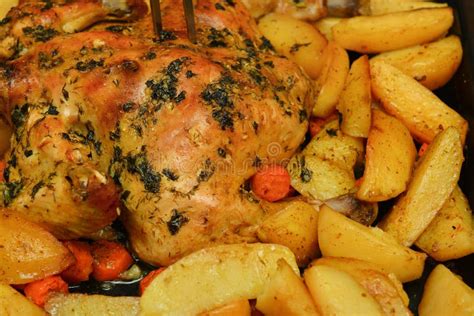 Baked In The Oven Chicken With Potatoes Carrots Herbs And Spic Stock