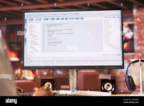 Coder At Workstation Programming On Computer Writing Lines Of Code Using Development Tools