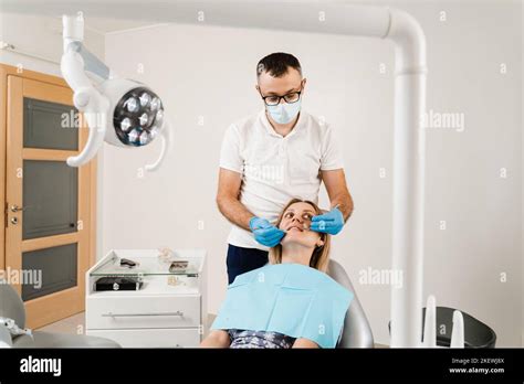 Dentist Examines Girl Mouth And Teeth And Treats Toothaches Happy