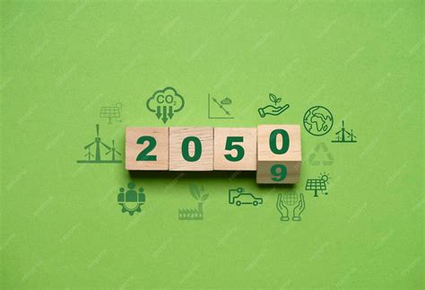 Premium Photo Flipping 2050 And Co2 Reducing Icon On Green Background