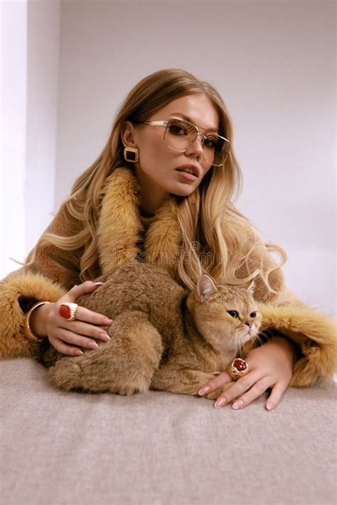 Beautiful Slavic Woman With Blond Hair In Elegant Outfit Fur Coat And