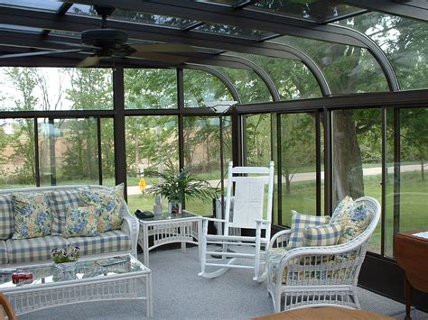 Sunroom With Curved Glass Eave